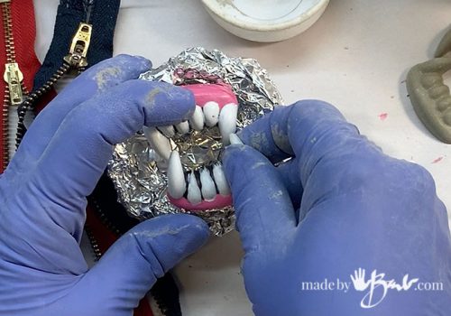 DIY Concrete Vampire Rocks - Made By Barb - zipper teeth rocks