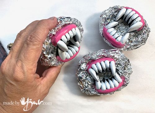 DIY Concrete Vampire Rocks - Made By Barb - zipper teeth rocks